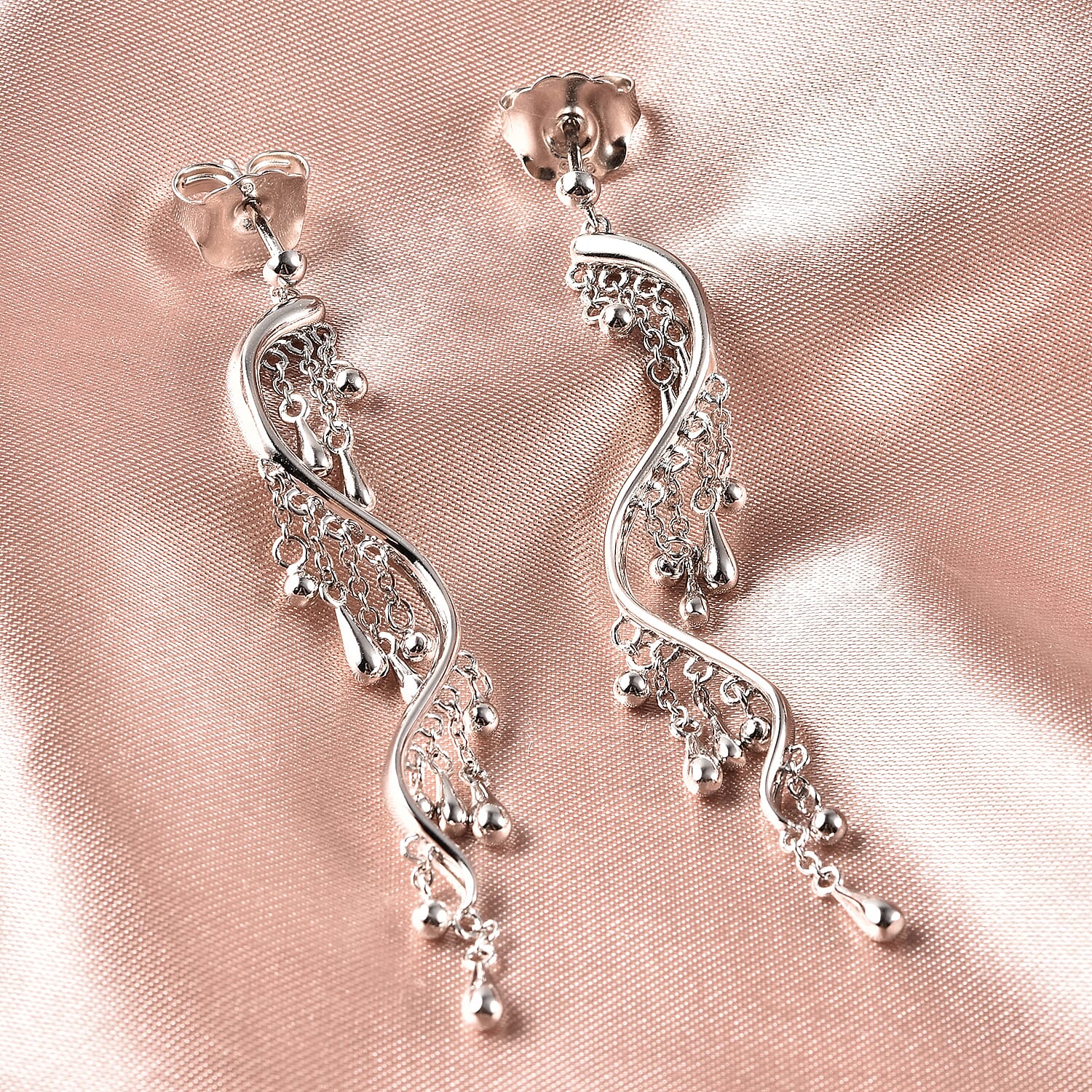 Lucy Q Drip Collection - Twisted Dangle Earrings in Rhodium Plated ...