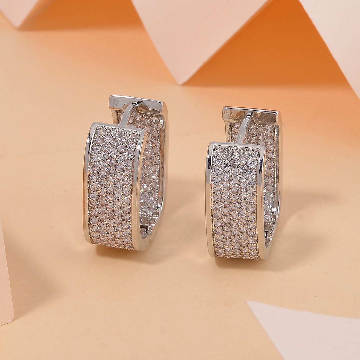 Designer Close Out -White Cubic Zirconia Inside Out Hoop Earrings ...